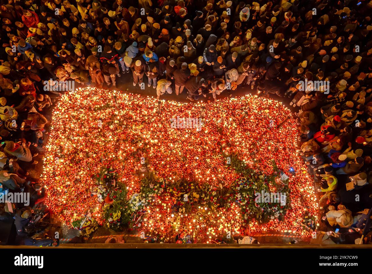 People light candles at the Velvet Revolution memorial to commemorate ...