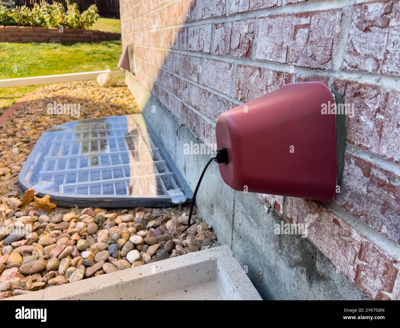 Brick Wall with Vent and Window Well in Late Fall Stock Photo - Alamy