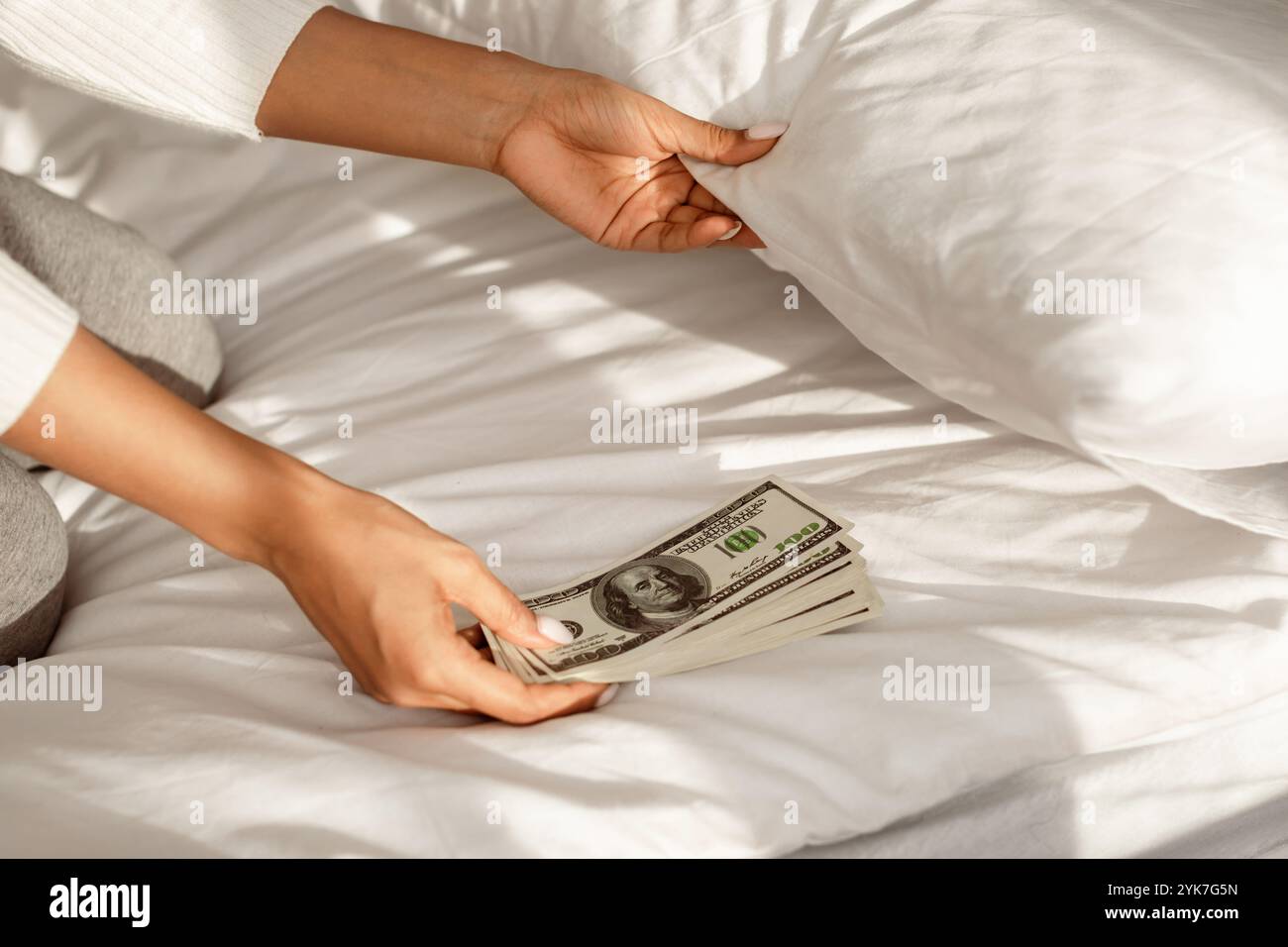 Money under pillow hi-res stock photography and images - Alamy