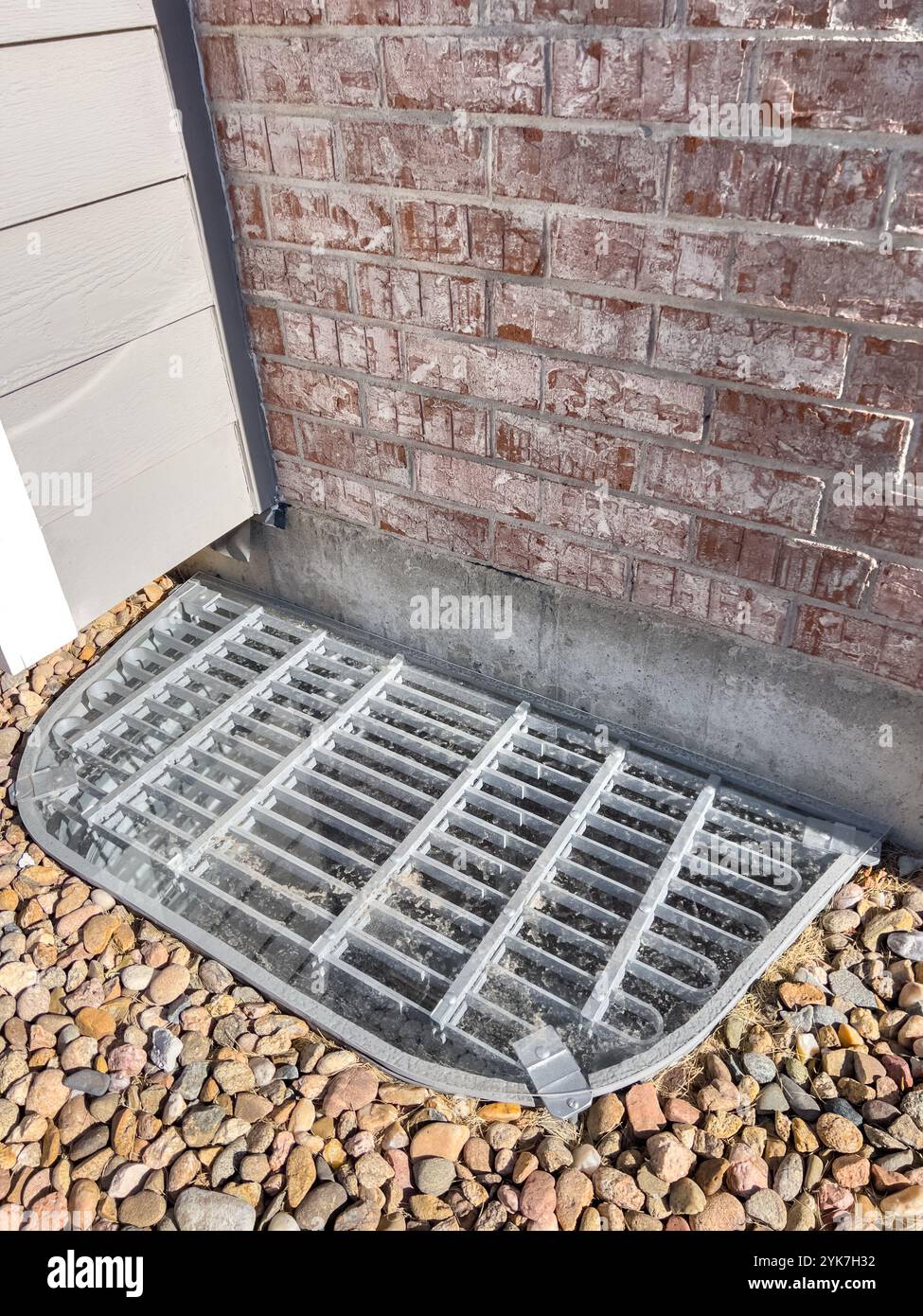 Custom Plexiglass Window Well Cover in Late Fall Stock Photo - Alamy