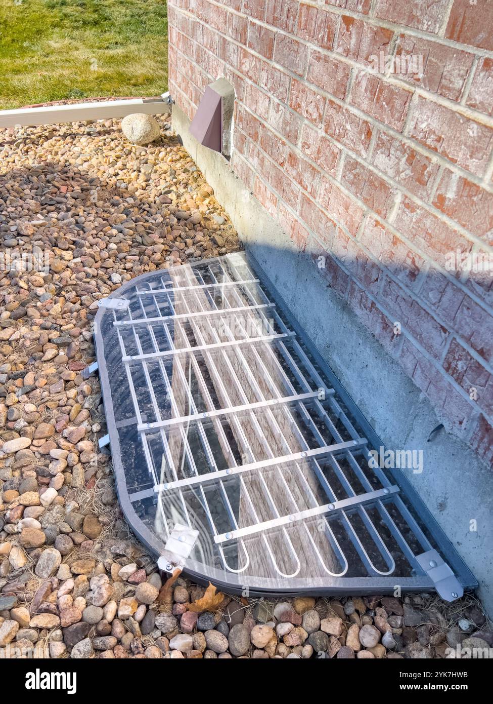 Custom Plexiglass Window Well Cover in Late Fall Stock Photo - Alamy