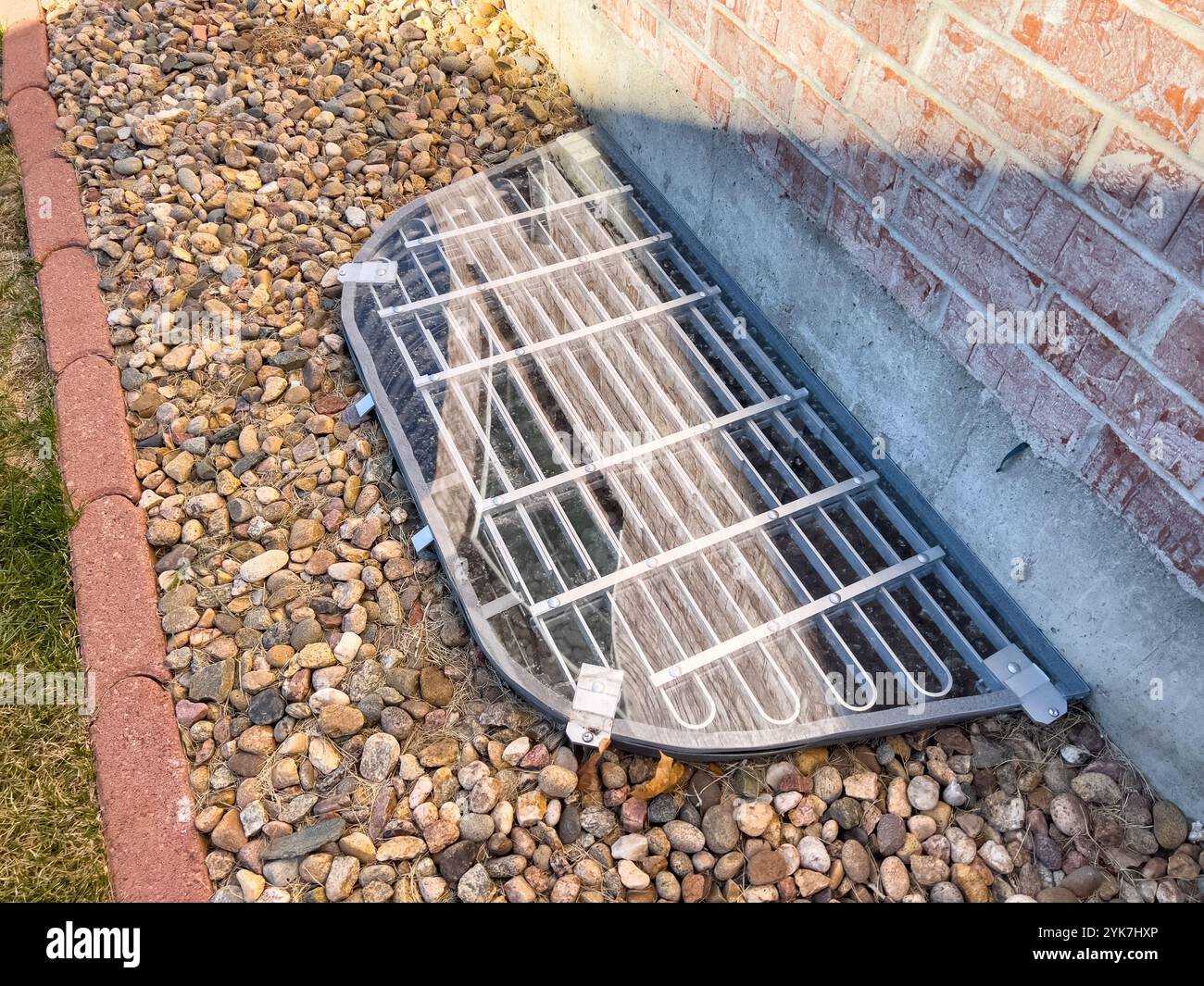 Custom Plexiglass Window Well Cover in Late Fall Stock Photo - Alamy