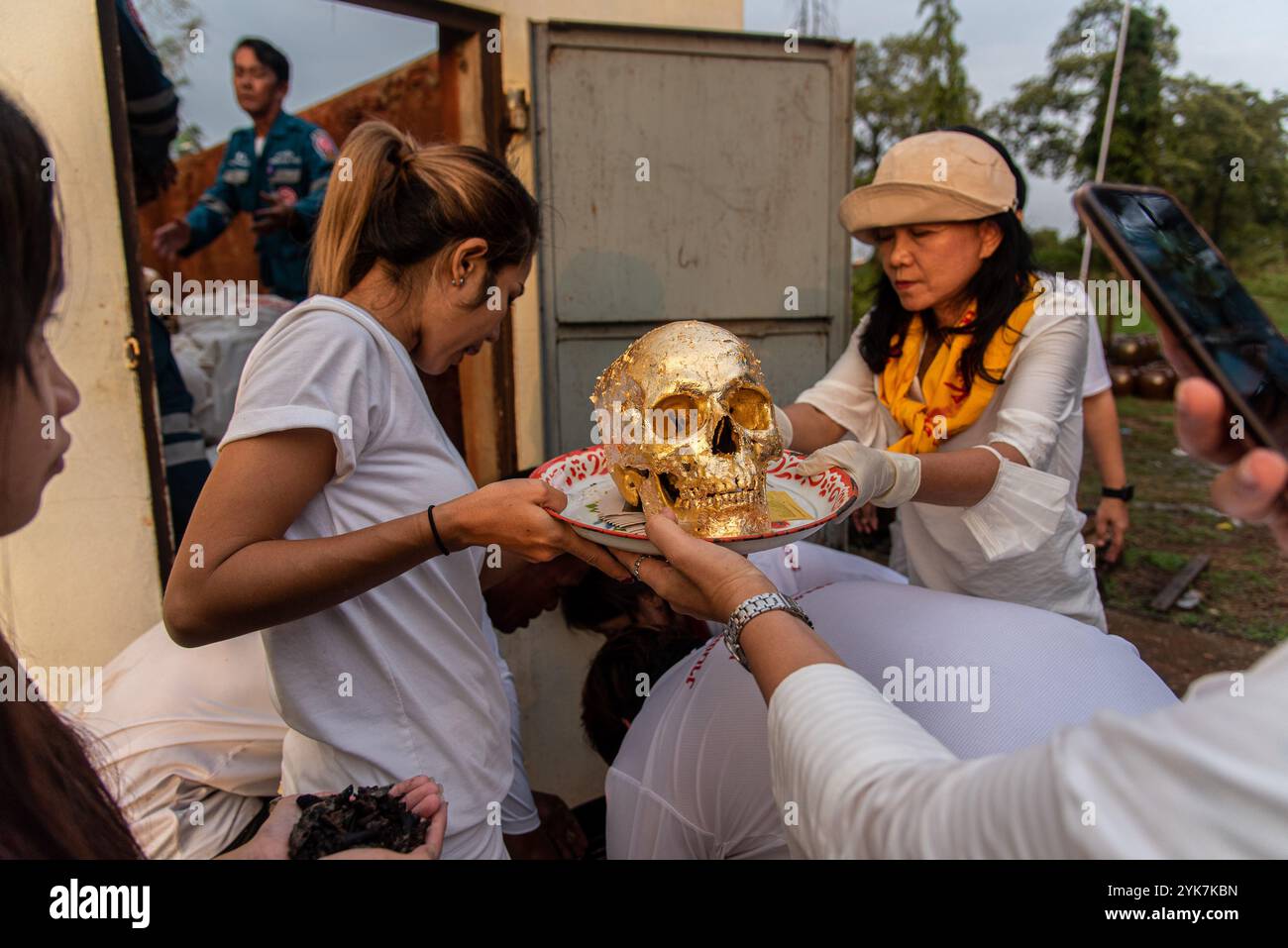 (EDITORS NOTE: Image contains graphic content)Volunteers seen arrange a ...