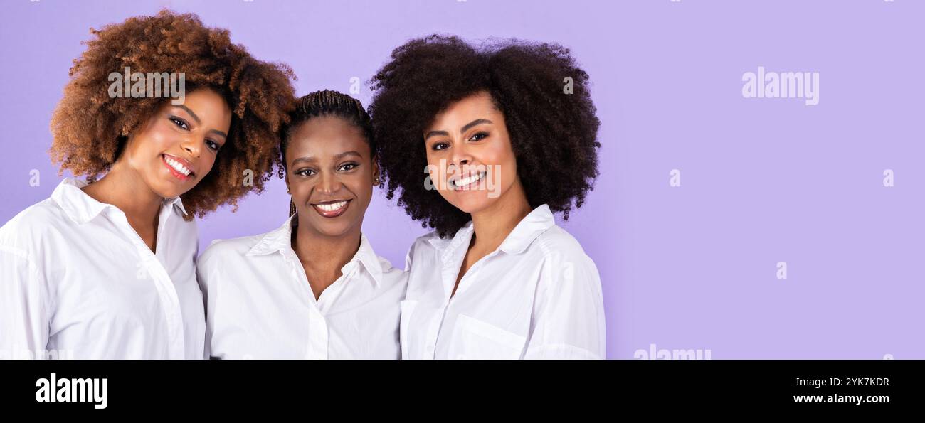 Portrait Of Three African Ladies Hugging Showing Unity, Purple ...
