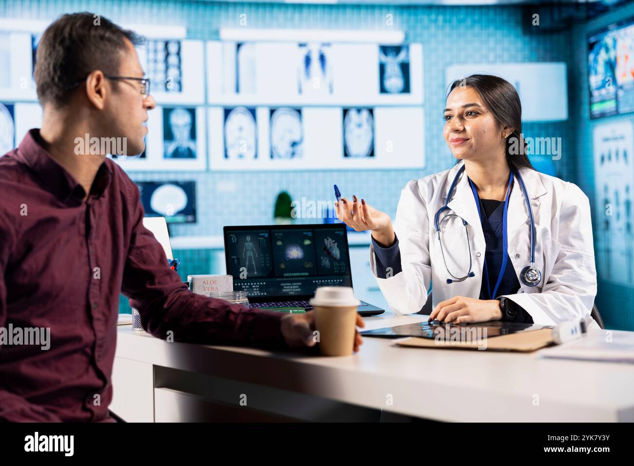 Specialist and patient discussing diagnostic results in a modern ...