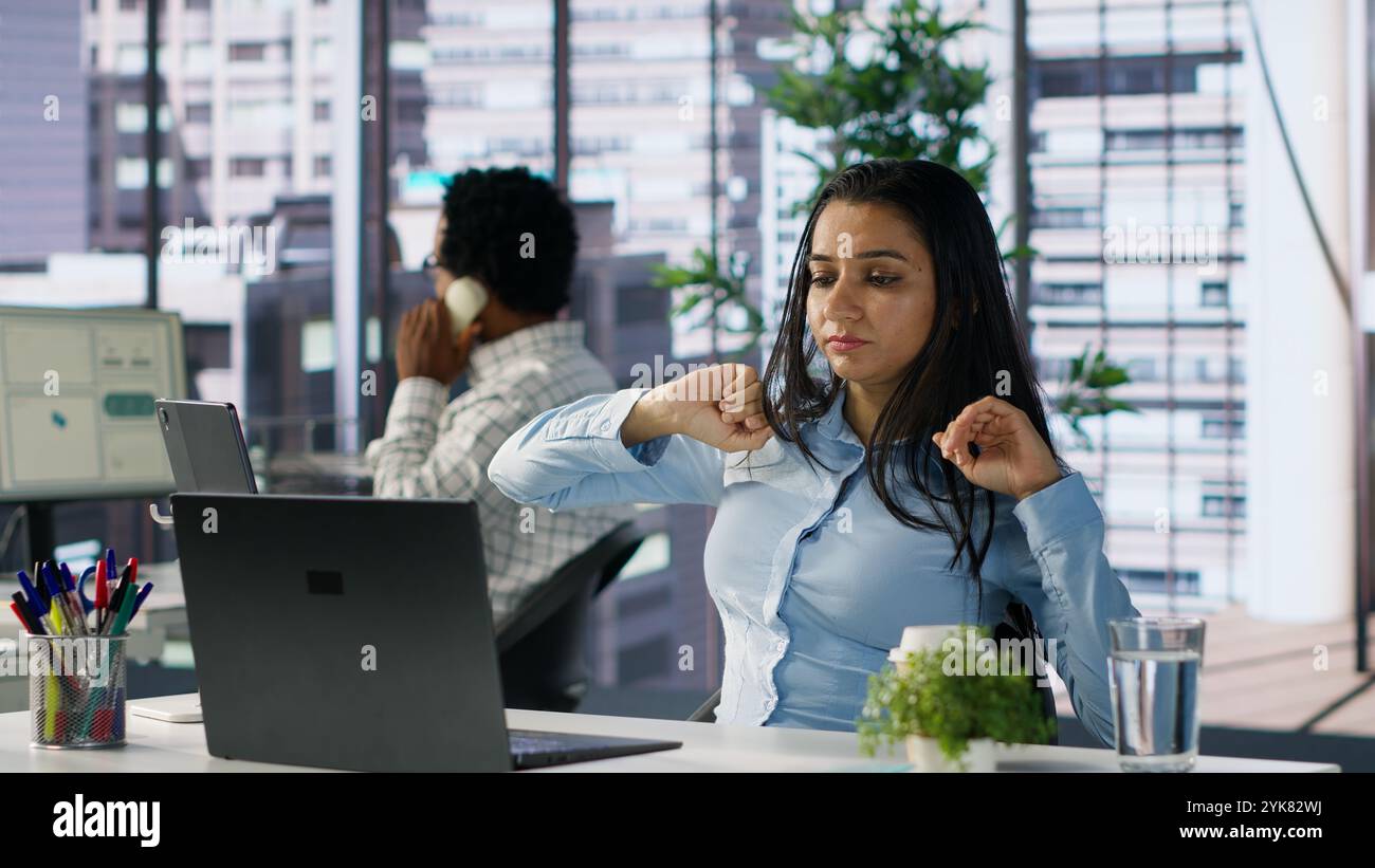 Professional manager struggles with burnout and a backache, juggling ...