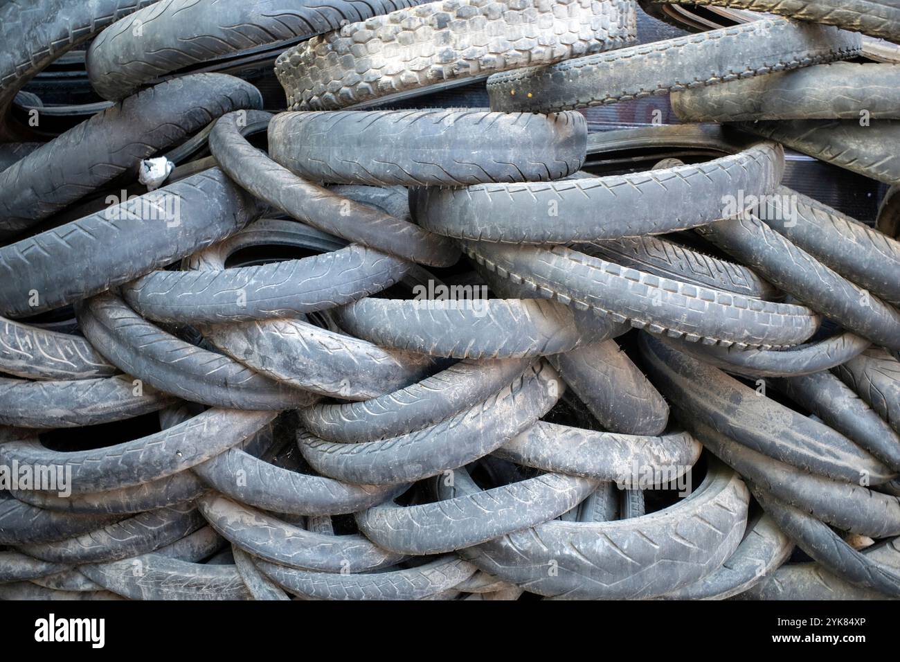 Pile tires in junkyard hi-res stock photography and images - Alamy
