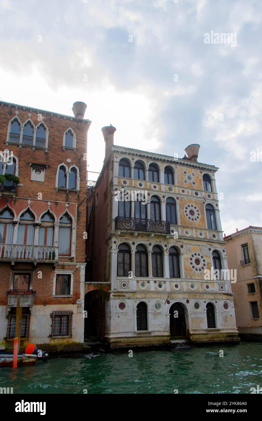 A view of historic Venetian buildings along the Grand Canal, showcasing ...