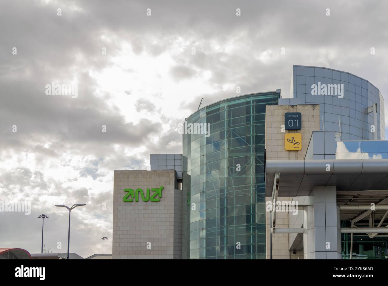 Modern airport terminal building with glass facade and prominent ...