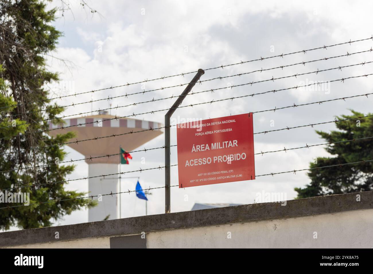 Red warning sign indicating restricted military area of the portuguese ...