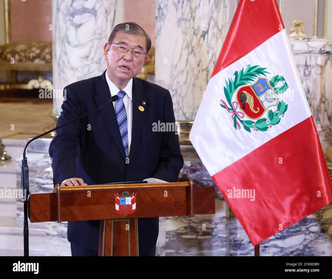 Japanese Prime Minister Shigeru Ishiba and Peruvian President Dina ...