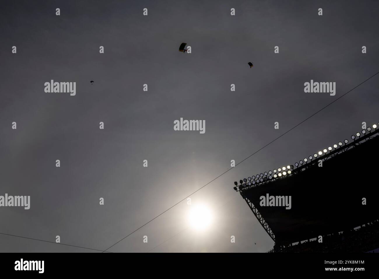 Members of the Para-Commando Parachute team jump into Acrisure Stadium ...