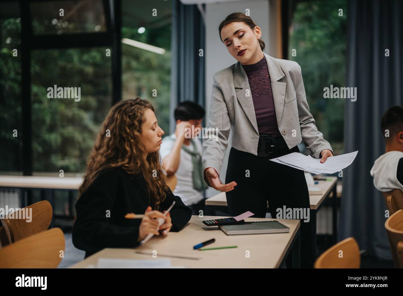 Schoolwork help in class hi-res stock photography and images - Alamy