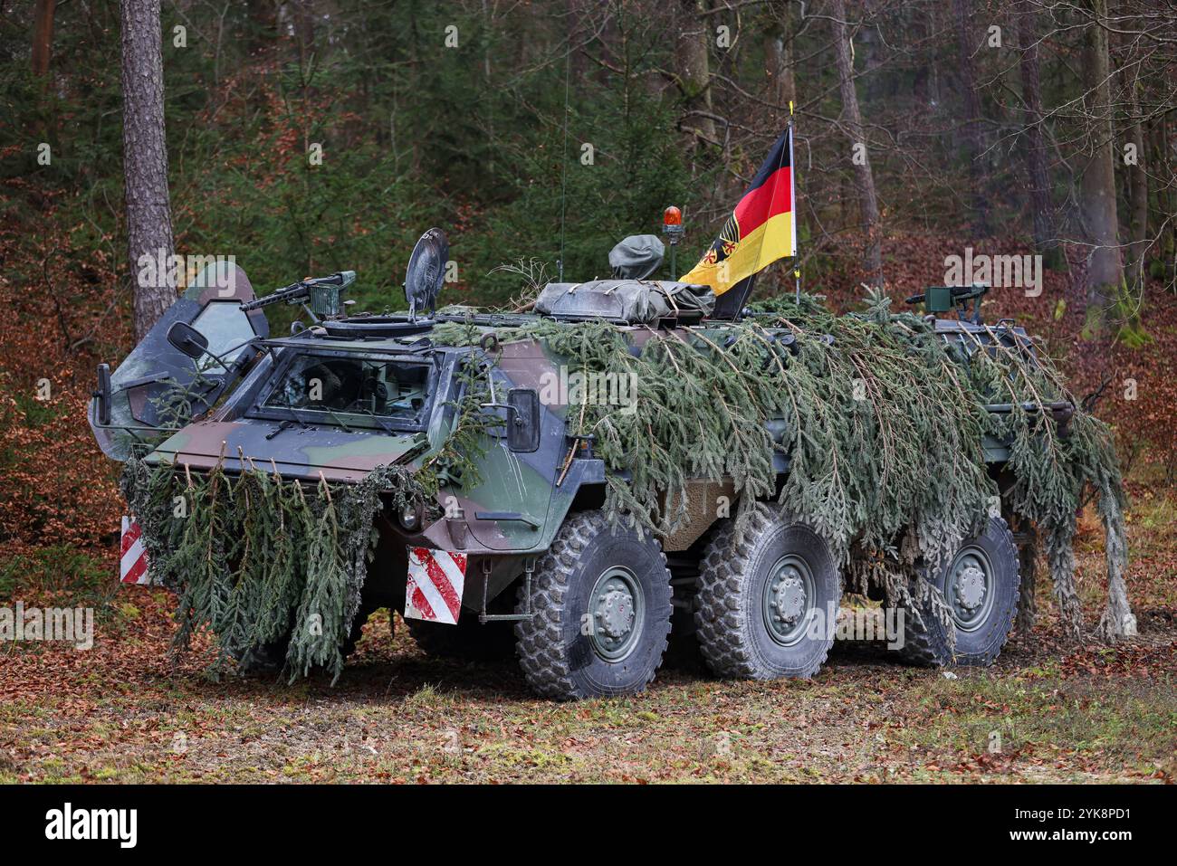 The German flag waves on a TPz Fuchs armored personnel carrier during ...