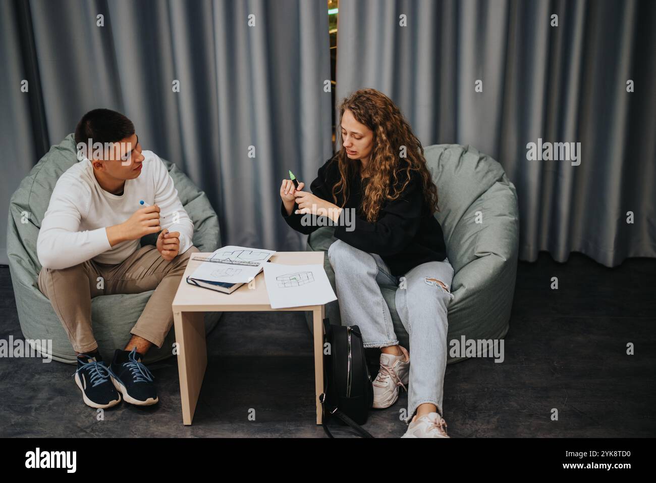 Young students working collaboratively on hi-res stock photography and ...