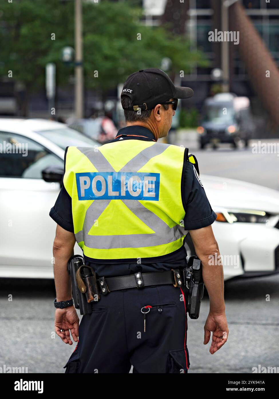 Toronto Canada / Toronto Policeman directing traffic in Downtown ...
