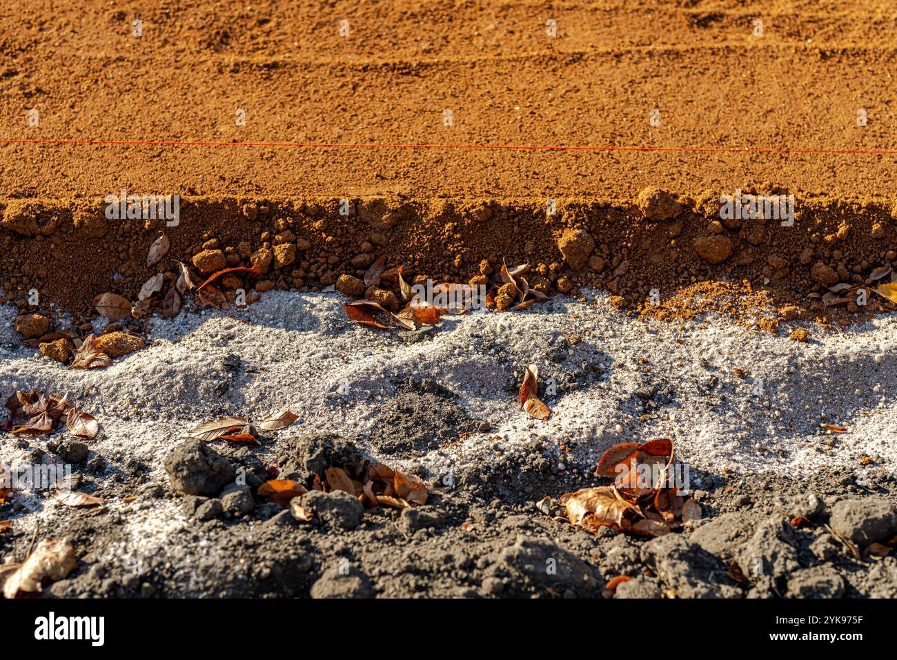 Construction photos of new baseball, softball, sports field red clay ...