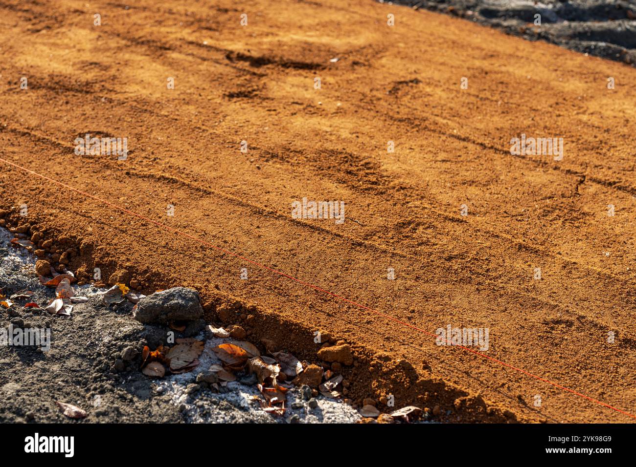 Construction photos of new baseball, softball, sports field red clay ...