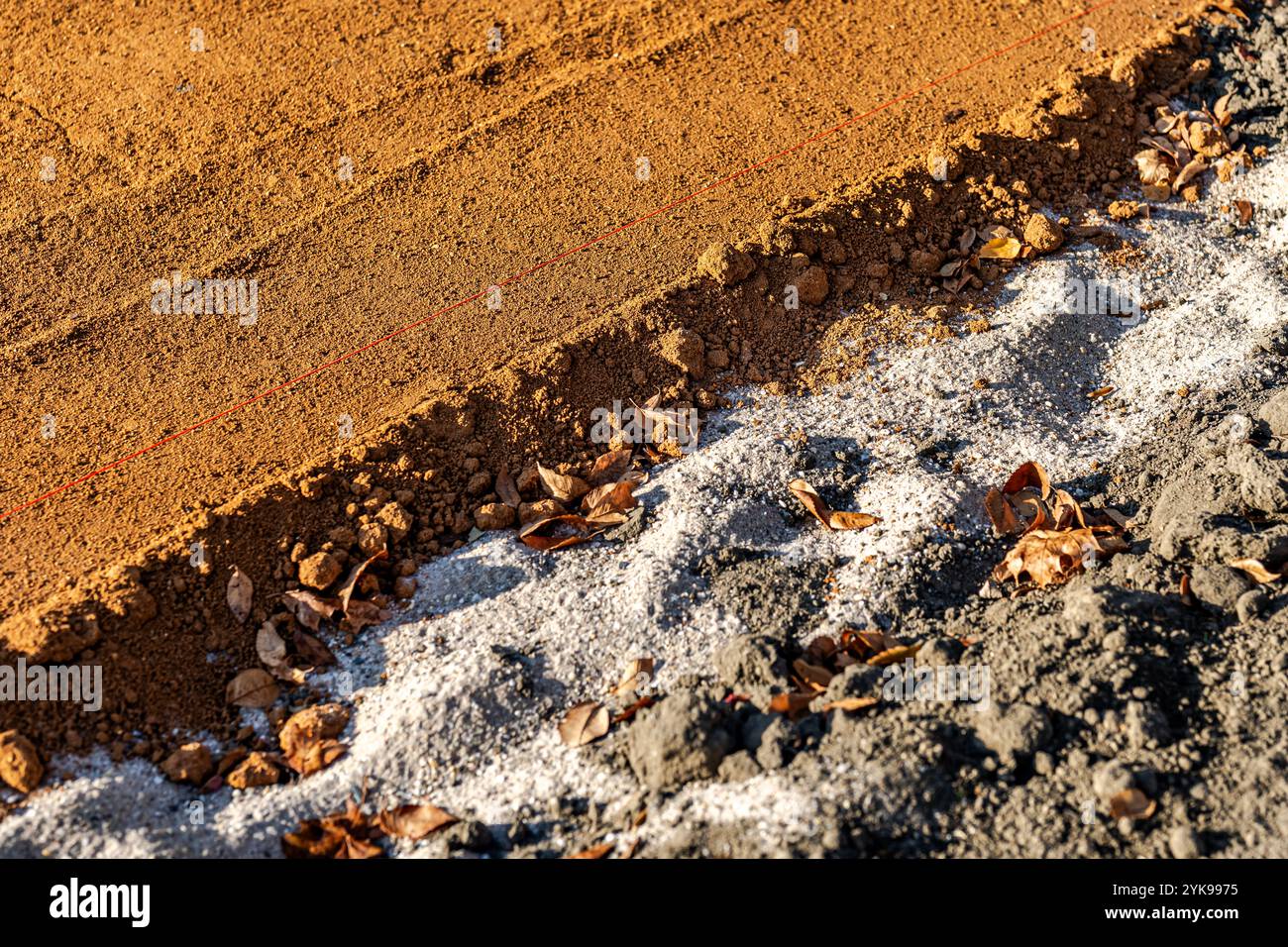 Construction photos of new baseball, softball, sports field red clay ...