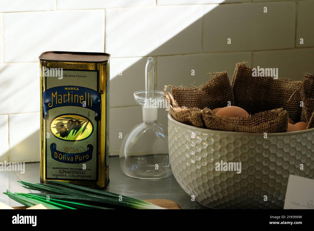 One quarter gallon tin can container of Marca Martinelli olive oil ...