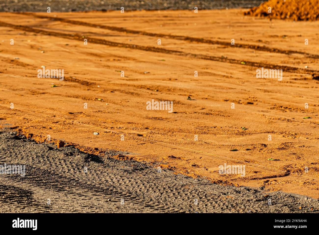 Construction photos of new baseball, softball, sports field red clay ...