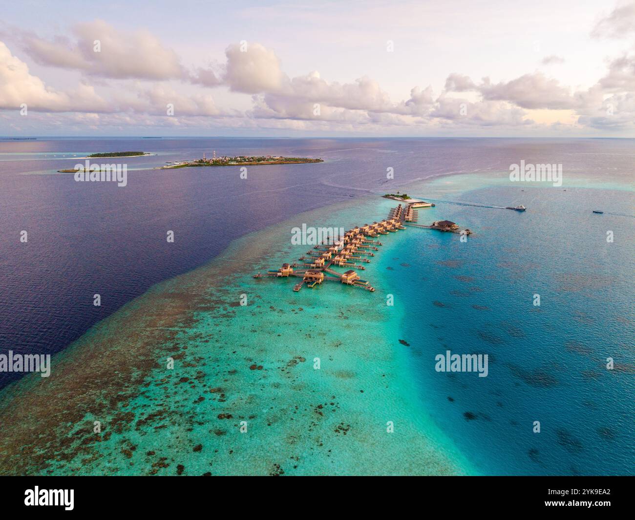 Aerial views of Velavaru Island at sunset in Maldives Stock Photo - Alamy