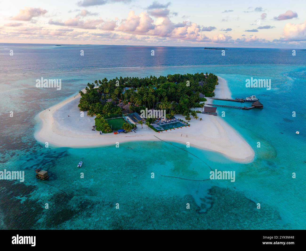 Aerial views of Velavaru Island at sunset in Maldives Stock Photo - Alamy
