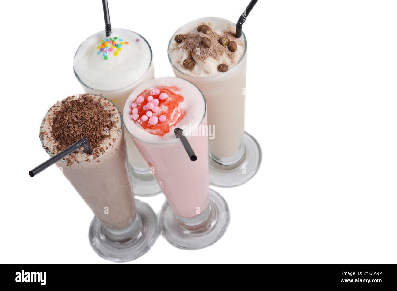 four types of milkshake drink on white background Stock Photo - Alamy