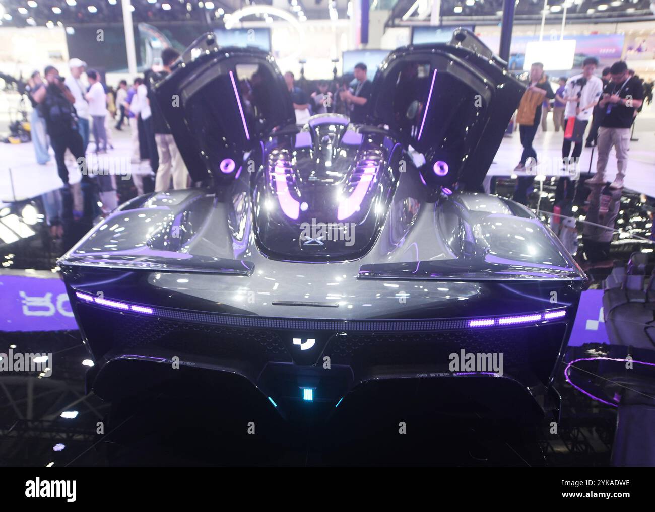 GUANGZHOU, CHINA - NOVEMBER 15, 2024 - Visitors view the world's first AI-powered supercar ROBO ...