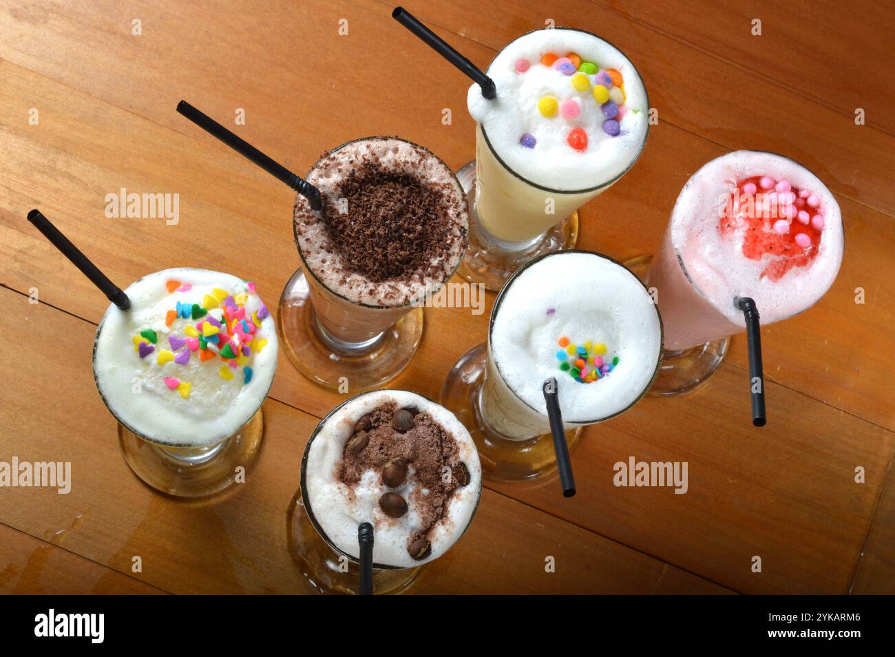 six types of milkshake drink on white background Stock Photo - Alamy