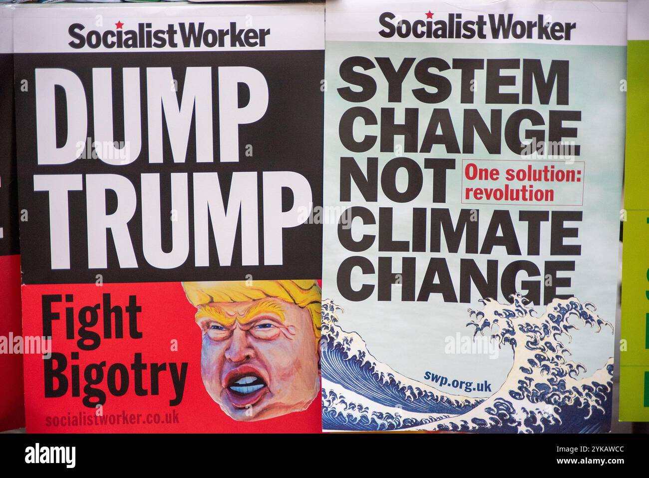 Posters duct taped to the table seen before the demonstration ...