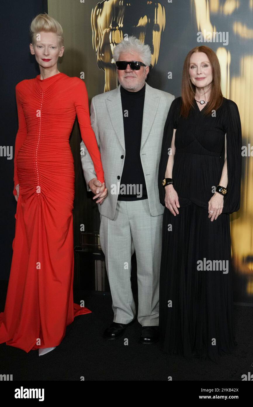 Tilda Swinton, from left, Pedro Almodovar and Julianne Moore arrive at ...