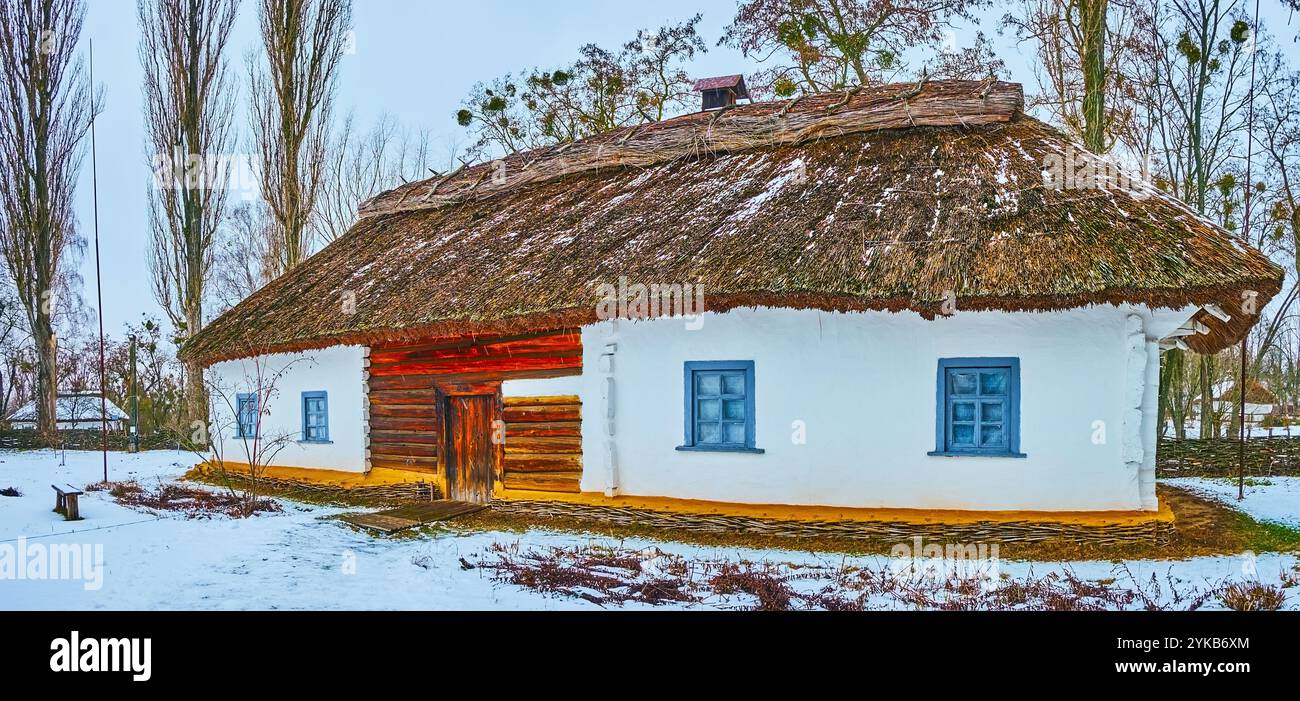 Panorama of the old village house with timber and adobe whitewashed ...