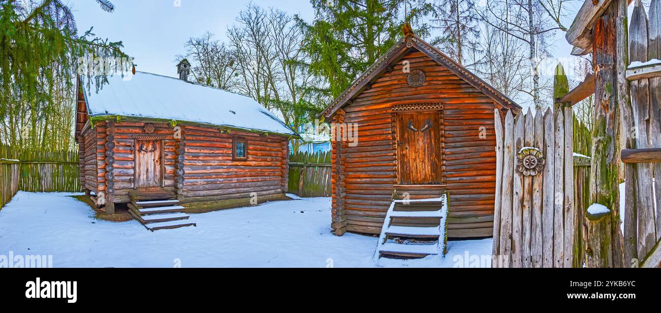 Panorama of an ancient Slavic estate with tall palisade (stakewall) and ...