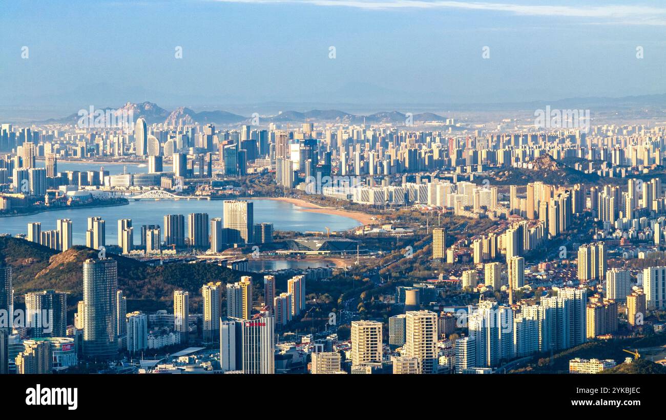 QINGDAO, CHINA - NOVEMBER 18, 2024 - Buildings stand side by side in ...