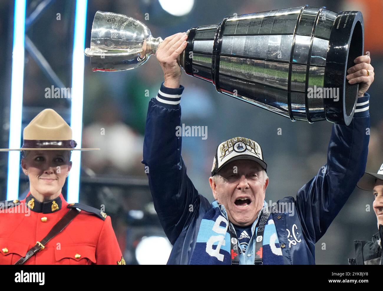 MLSE Chairman Larry Tanenbaum hoists the Grey Cup after defeating the ...