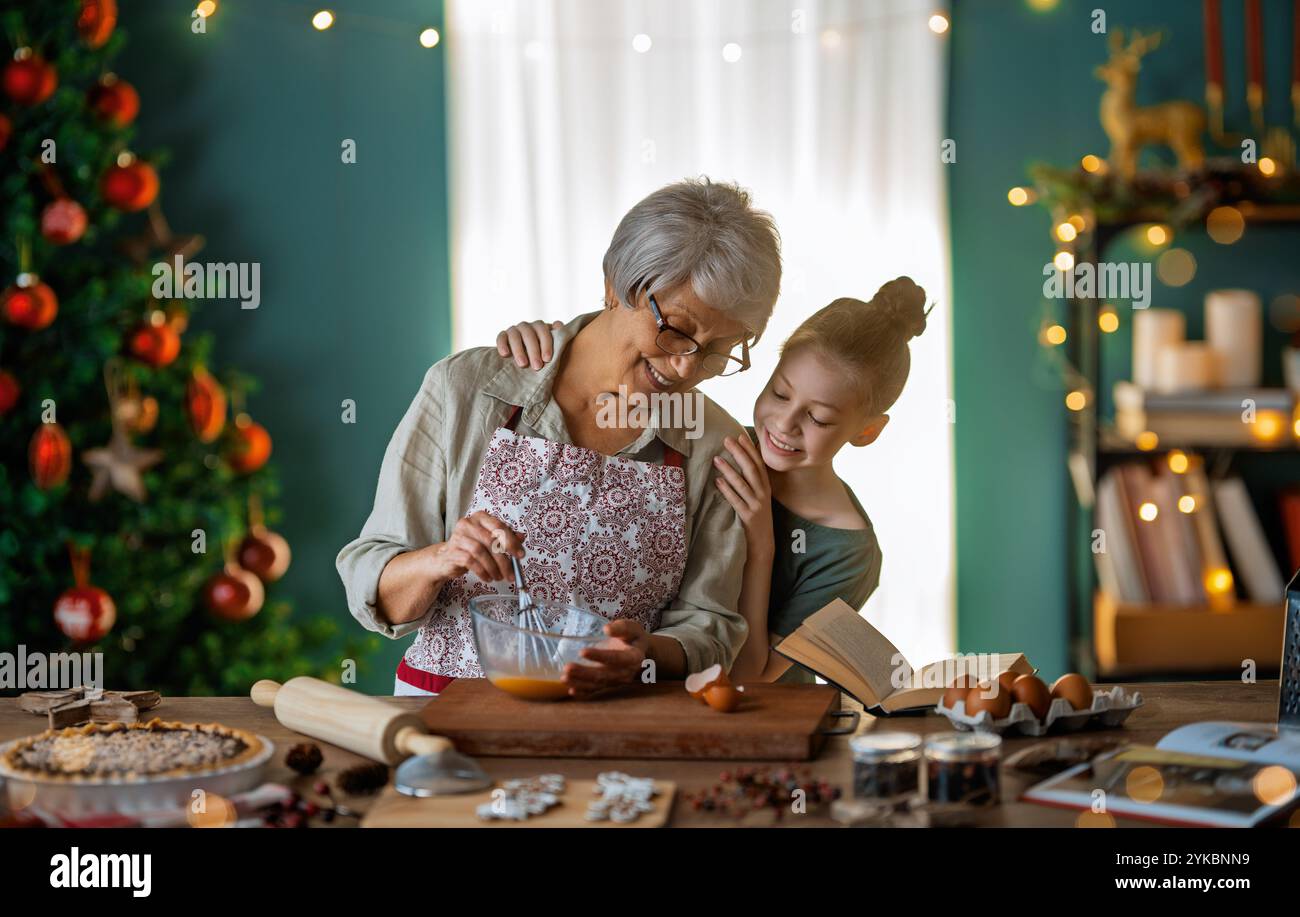 Merry Christmas and Happy Holidays. Family preparation holiday food ...