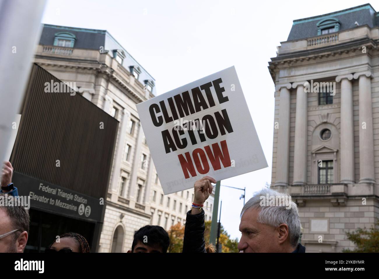 A climate protester holds a sign during environmental activists are ...