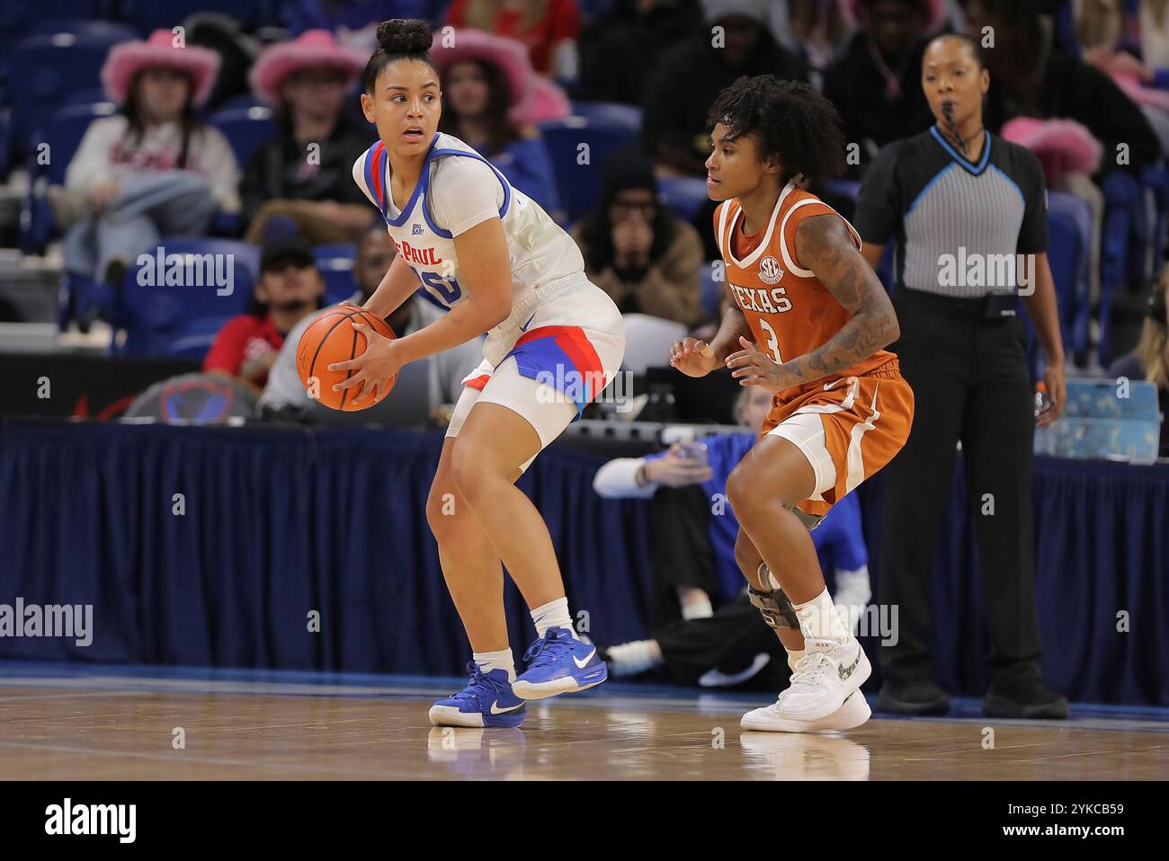 Texas guard Rori Harmon guards DePaul guard Angelina Smith during an ...
