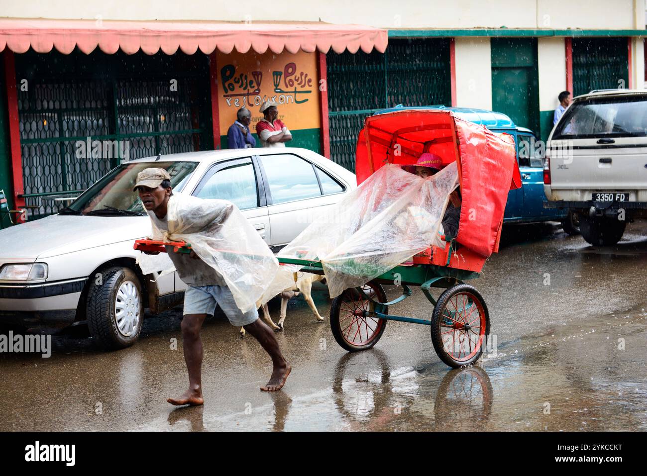 A pousse pousse in the streets of Antsirabe, Madagascar Stock Photo - Alamy