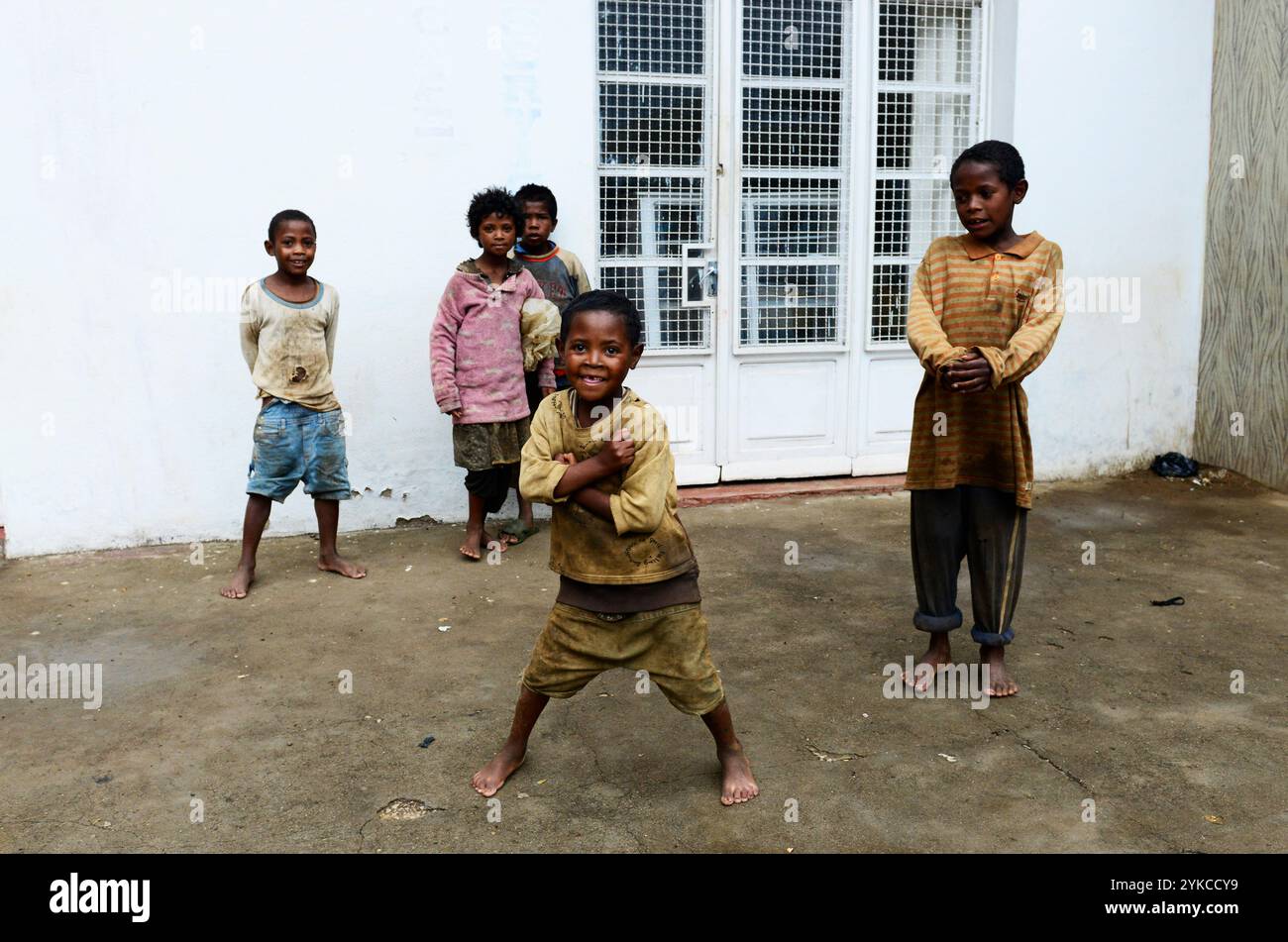 Malagasy children playing in a small courtyard in Antsirabe, Madagascar ...