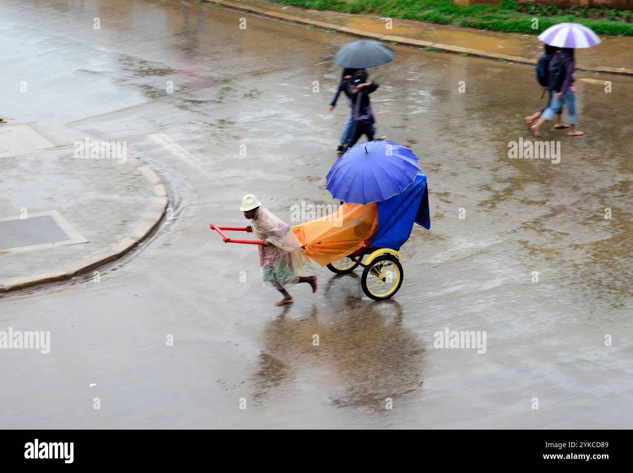 A pousse pousse in the streets of Antsirabe, Madagascar Stock Photo - Alamy