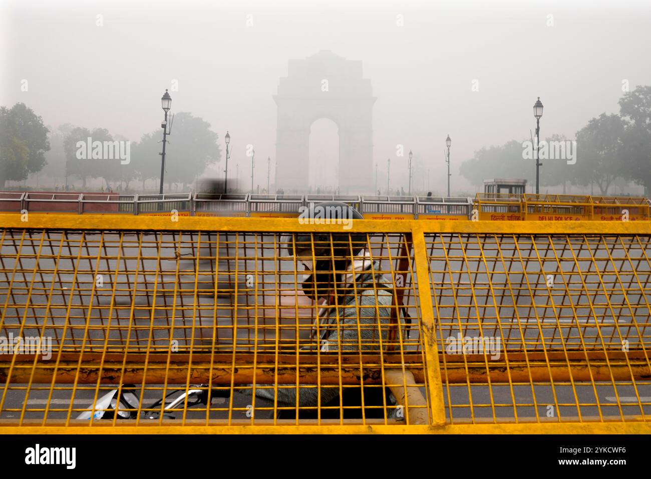 A commuter drives amidst a thick layer of smog as air pollution shoots ...