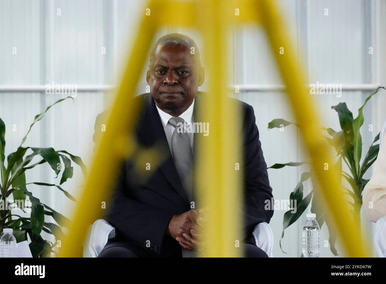 U.S. Defense Secretary Lloyd Austin listens during a groundbreaking ceremony for the Combined ...