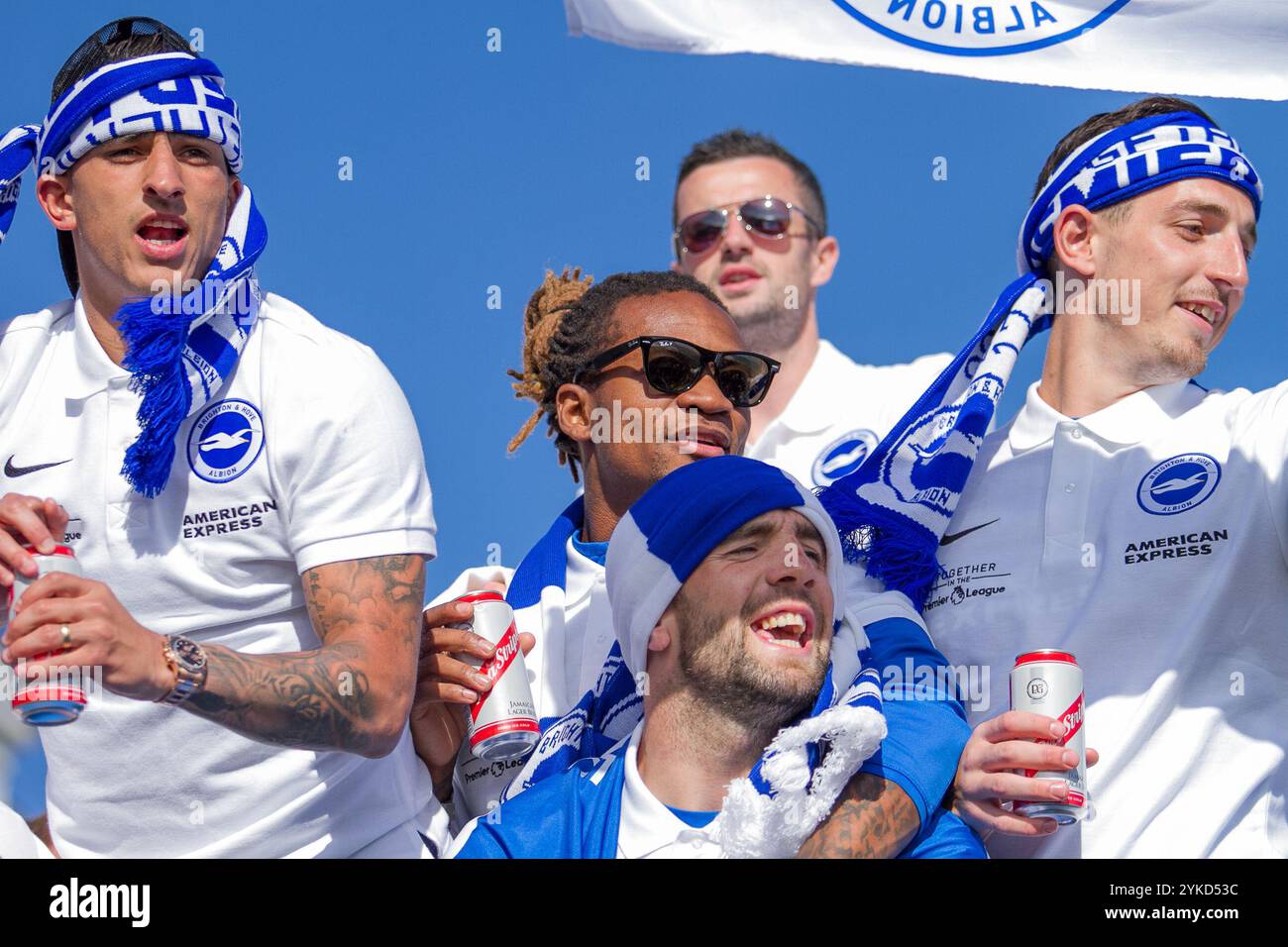 Thousands of football fans line the street in Brighton & Hove, to ...