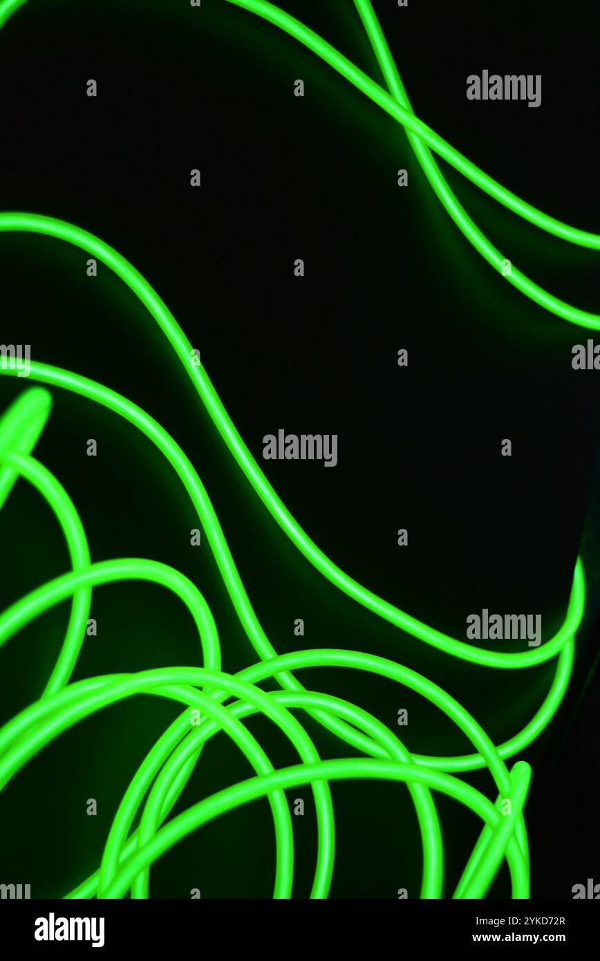 Bright glowing electroluminescent wires, light green, lime, green ...