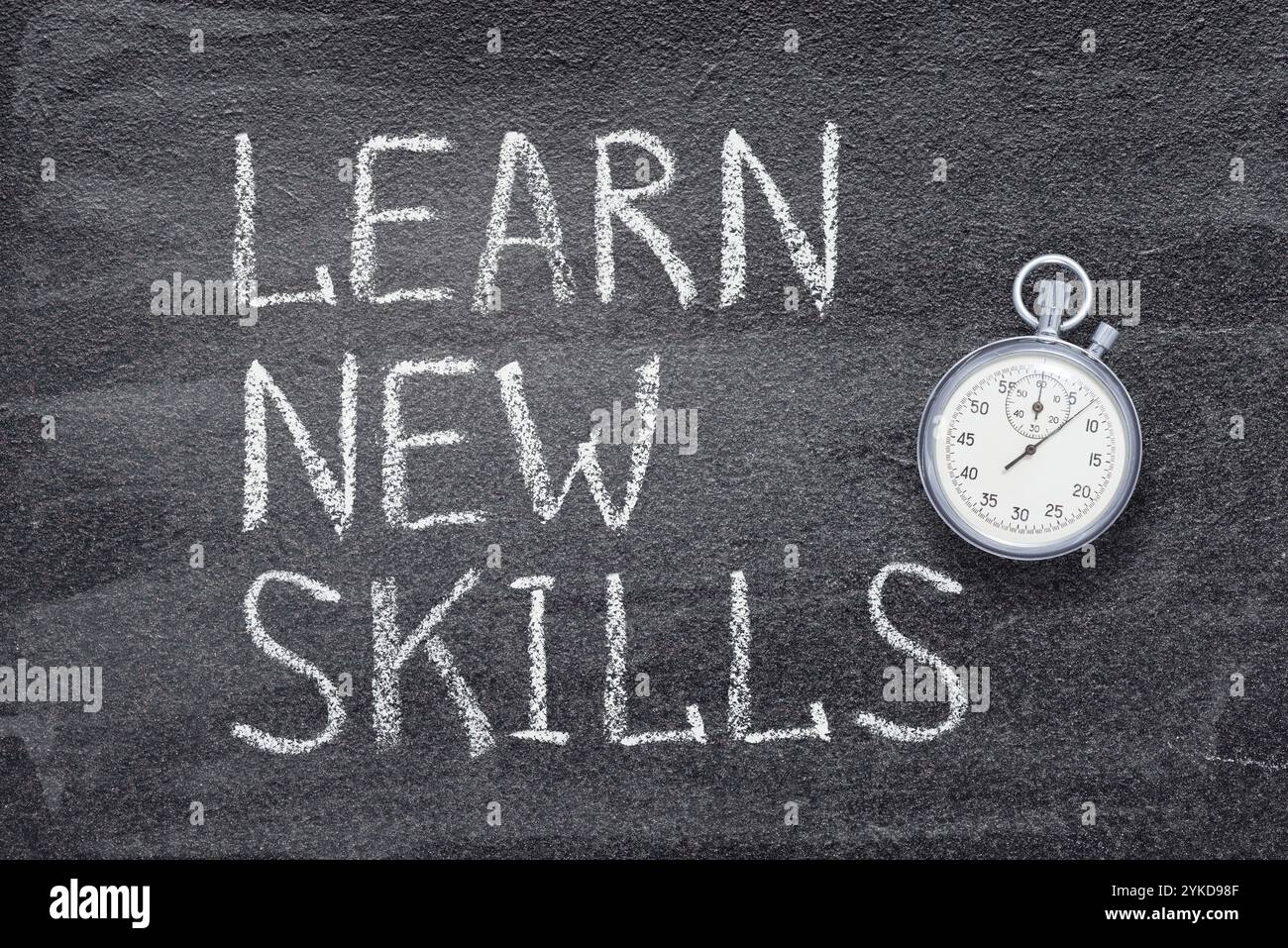 learn new skills phrase written on chalkboard with vintage precise ...