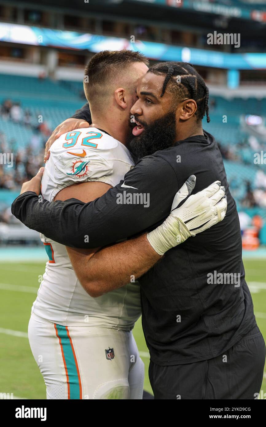Miami Gardens, FL USA; Miami Dolphins defensive tackle Zach Sieler (92) hugs former Dolphin and ...