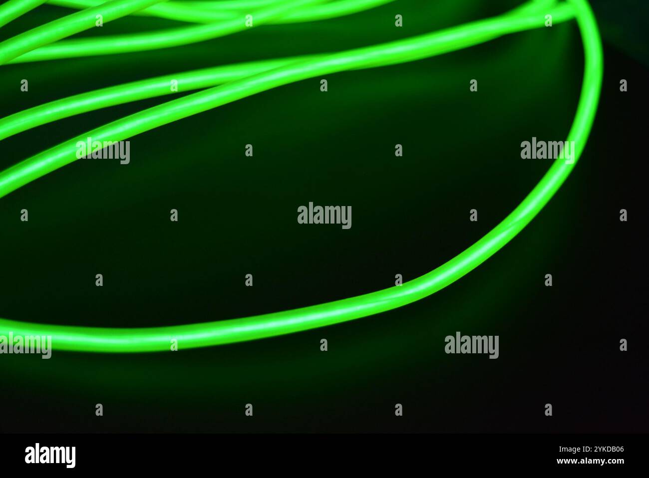 Bright glowing electroluminescent wires, light green, lime, green ...