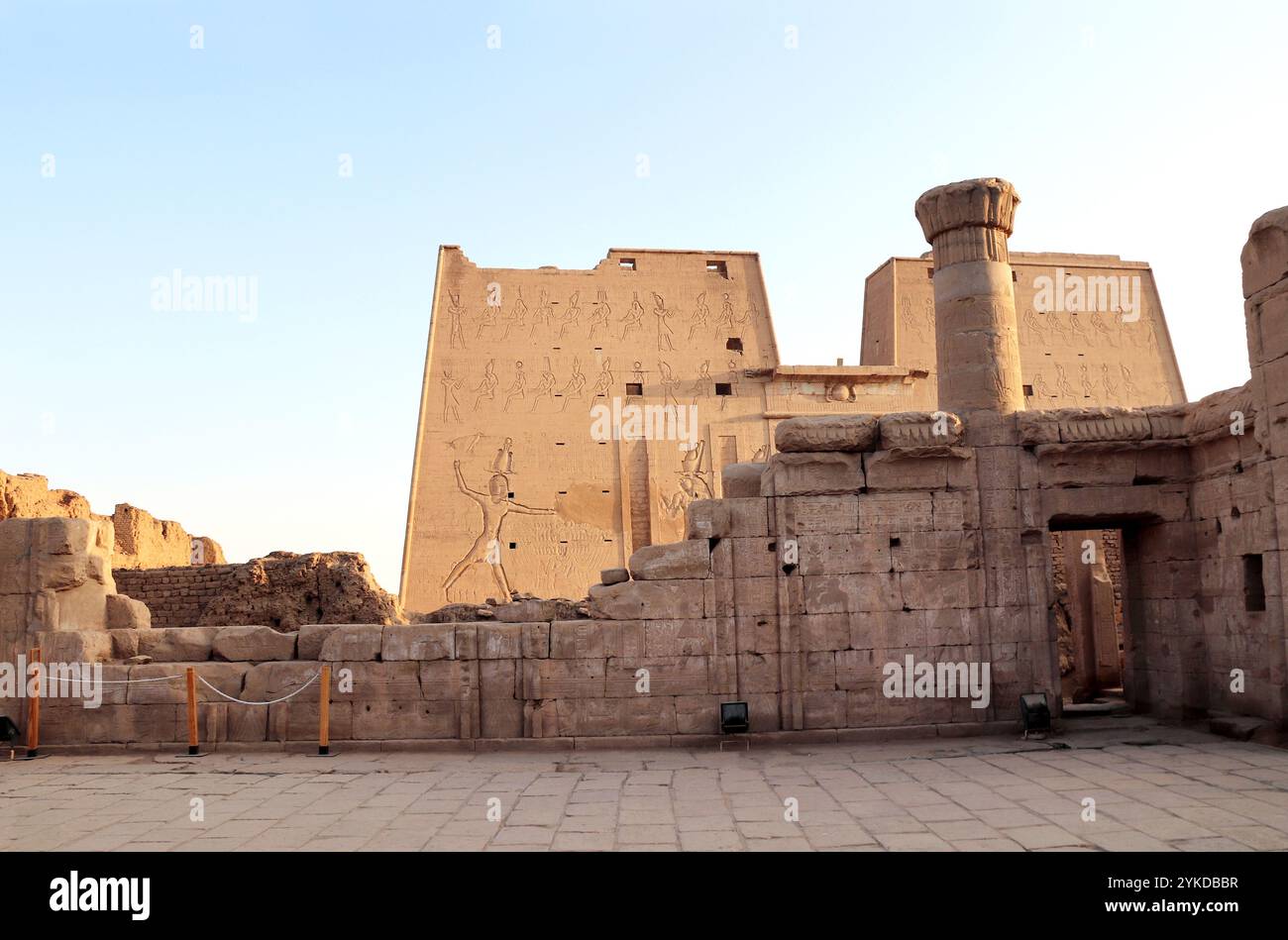 Entrance Temple of Horus in sunset light, Edfu, Egypt. Famous landmark ...